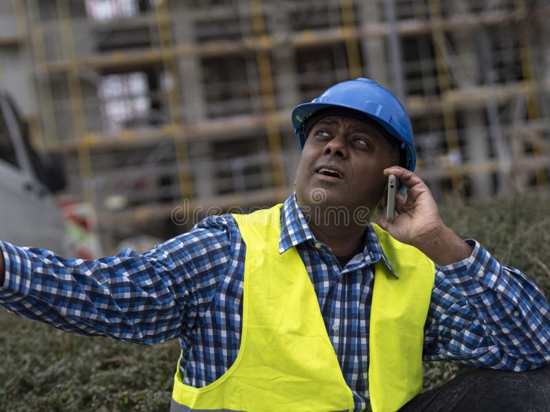 Engineer on phone stock photo. Image of expertise, industrial - 243878930