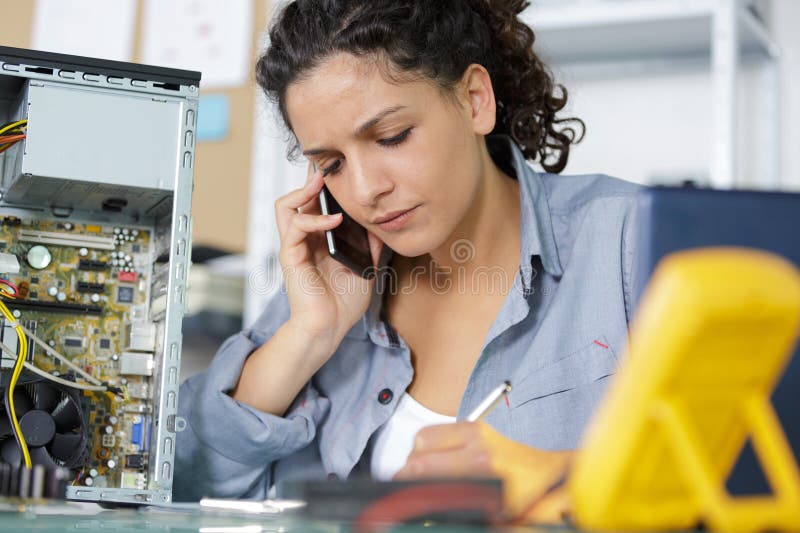 Engineer on Phone Working with Circuits Stock Photo - Image of person ...