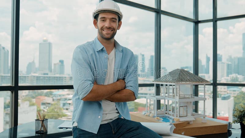 Engineer Place Project Plan on Table while Sitting with Arm Folded ...