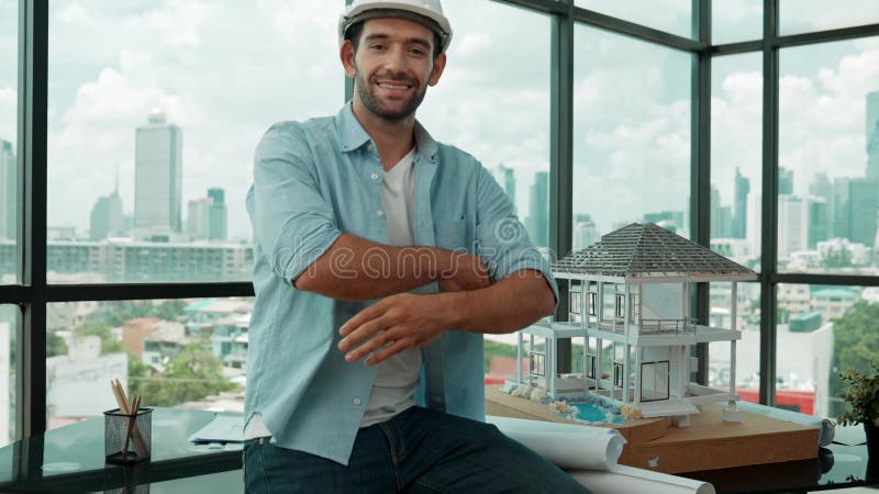 Engineer Place Project Plan on Table while Sitting with Arm Folded ...