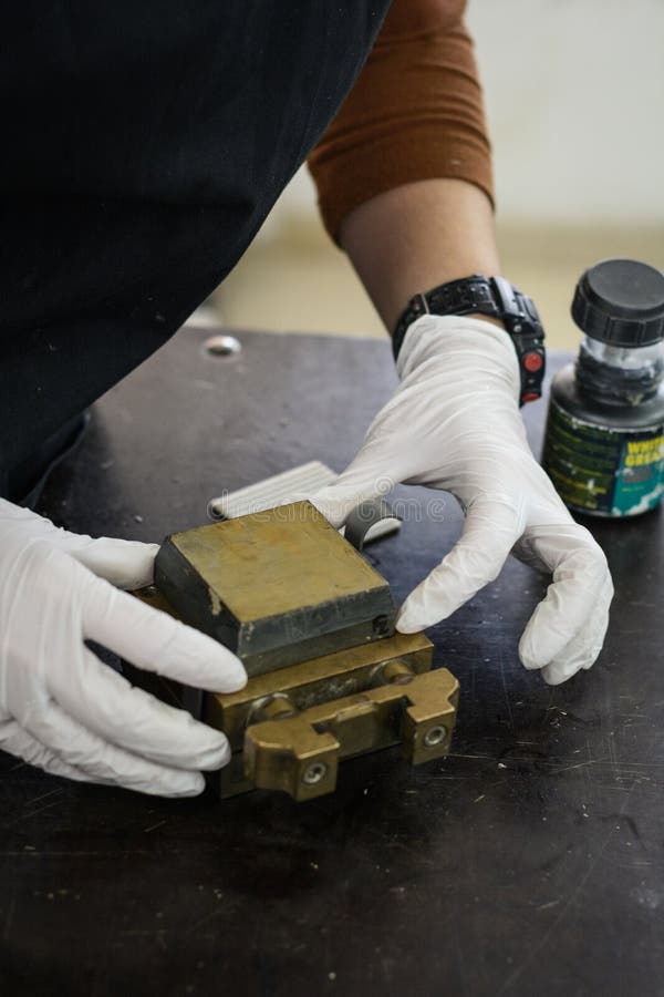 Engineer Preparing a Soil Sample in a Mold for Direct Shear Laboratory ...