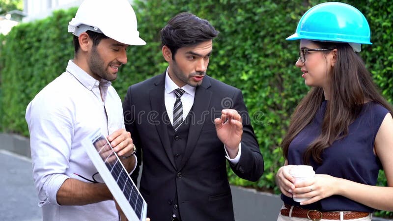 Engineer Presenting the Solar Cell Work for Businessman. Engineer ...