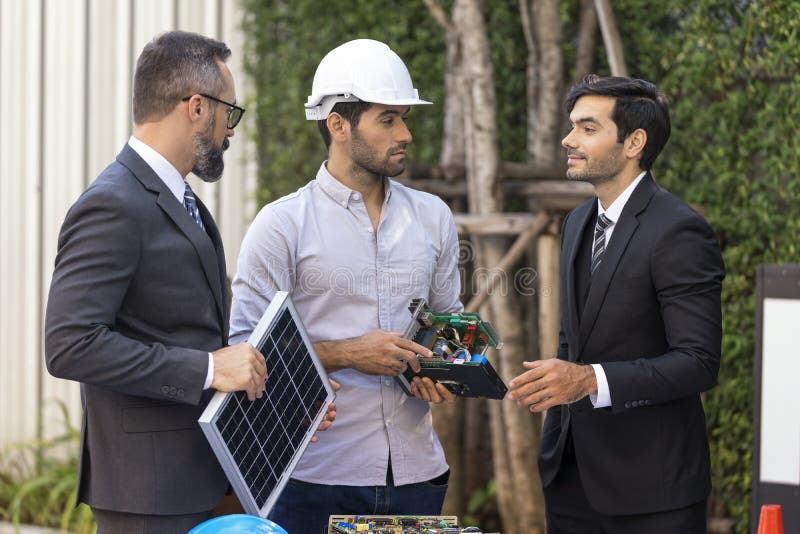 Engineer Presenting the Solar Cell Work for Businessman. Engineer ...