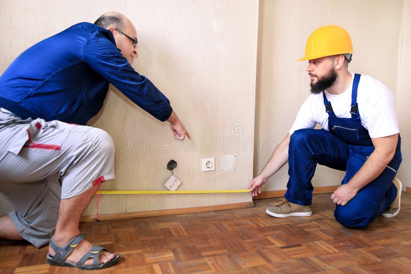 Engineer and Project Manager with His Colleague, Construction Worker is ...