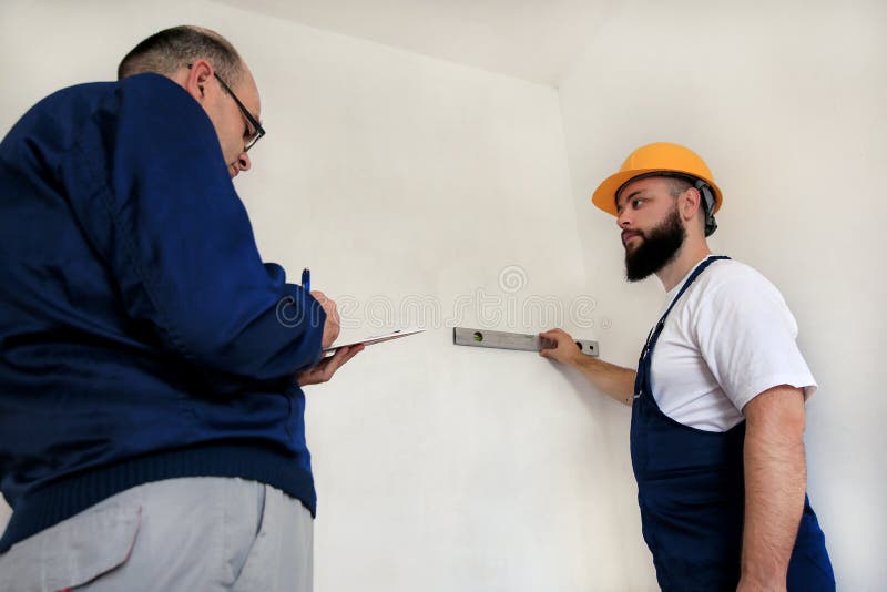 Engineer and Project Manager with His Colleague, Construction Worker is ...