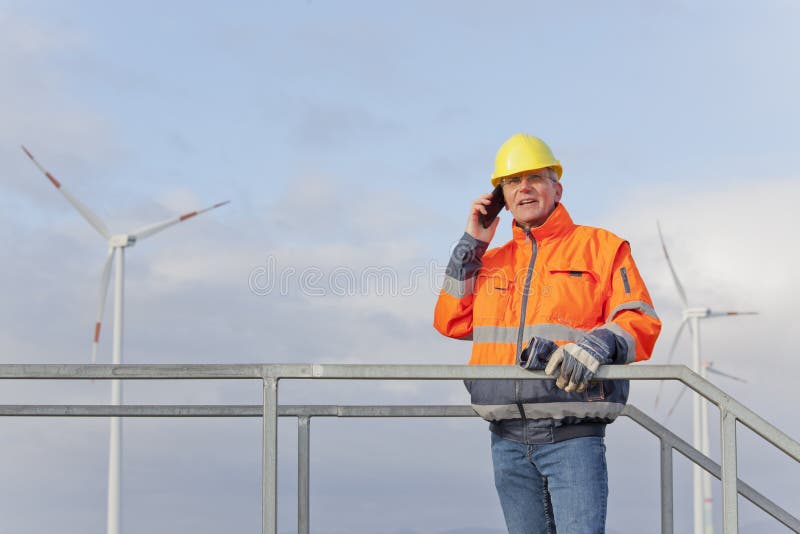 Engineer with mobile phone stock image. Image of phone - 10776527