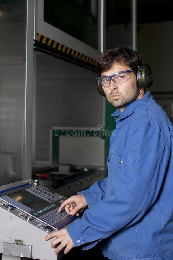 Engineer pushing a button stock image. Image of machine - 24498069