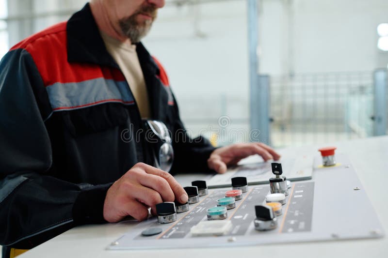 Engineer Pushing Buttons on Machine Stock Photo - Image of factory ...