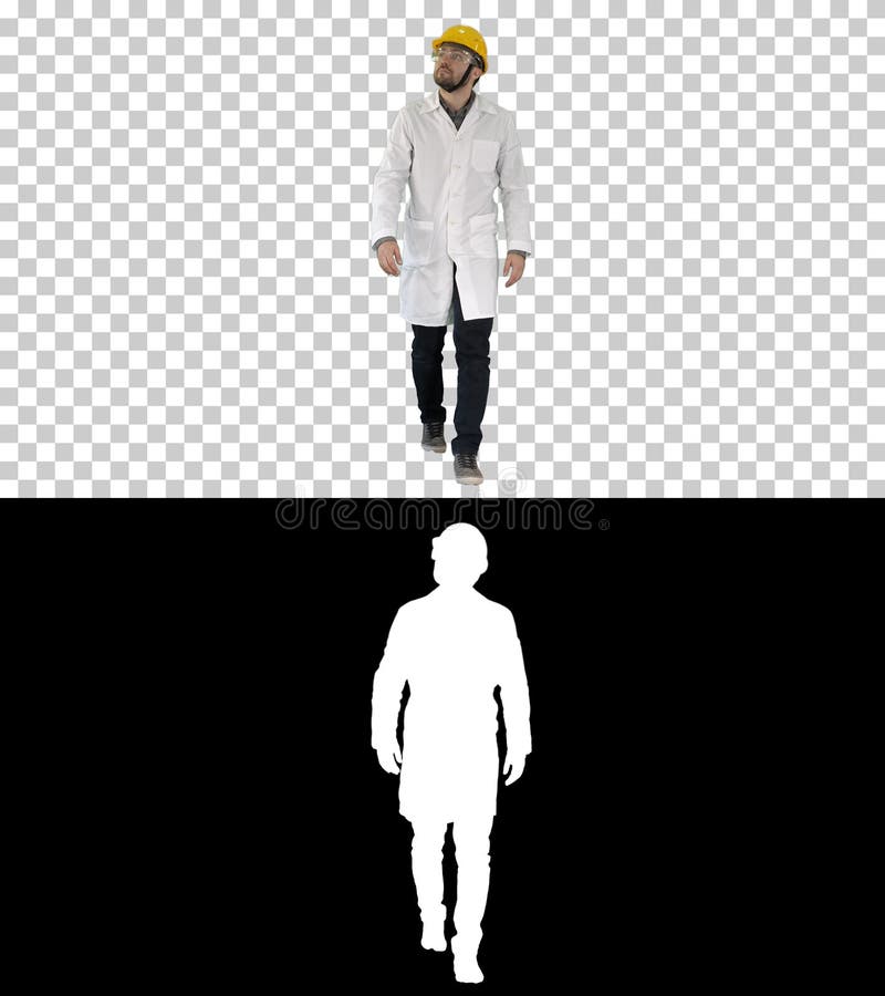 Engineer Putting on Protactive Glasses while Walking, Alpha Channel ...