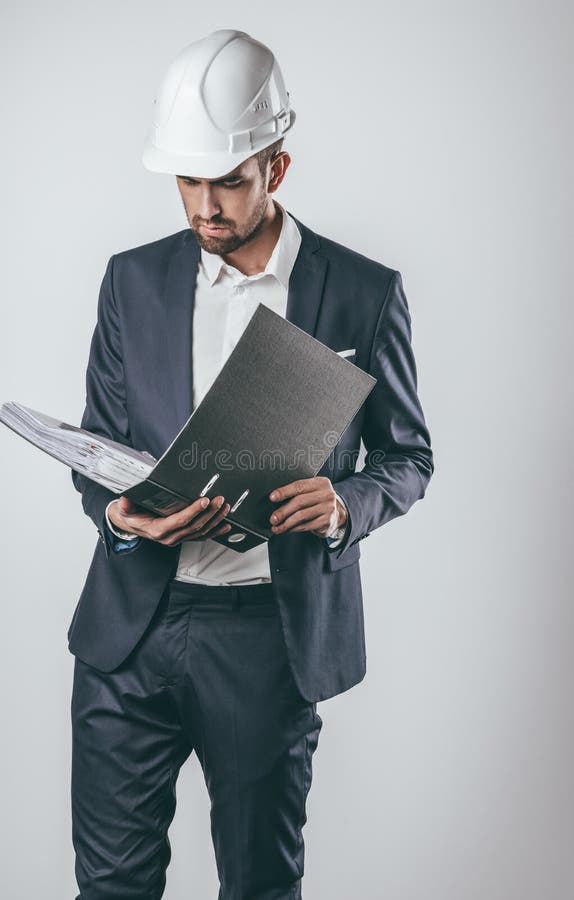 Engineer Reading Data in Folder Stock Photo - Image of folder ...