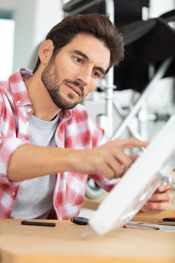 Engineer Repairing Microcircuit in Workshop Stock Photo - Image of ...