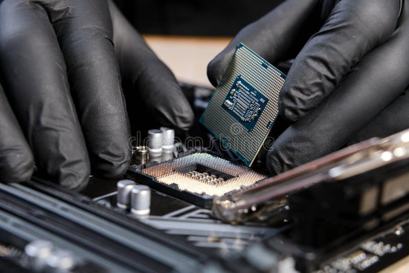 Engineer Repairman Holding Hands in Black Gloves Chip Processor CPU To ...