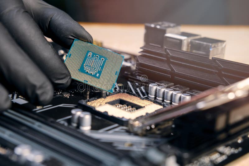 Engineer Repairman Holding Hands in Black Gloves Chip Processor CPU To ...