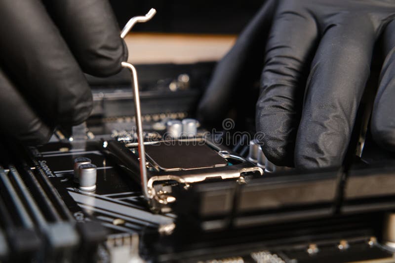 Engineer Repairman Holding Hands in Black Gloves Chip Processor CPU To ...