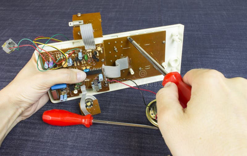 Engineer Repairs Chip Board with a Screwdriver Stock Photo - Image of ...