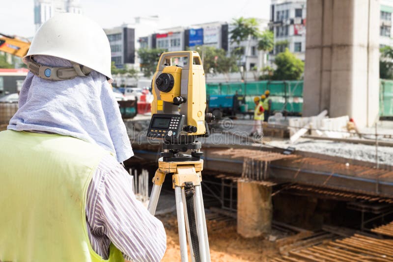 Engineer Reviewing the Dumpy Automatic Level Instrument Readings ...
