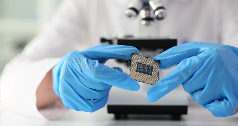 Engineer Holds Computer Part in Form of Chip in Office Stock Footage ...