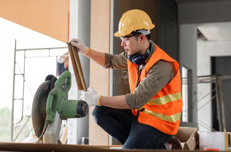 Engineer in Safety Gear Working on Construction Site with Tools and ...