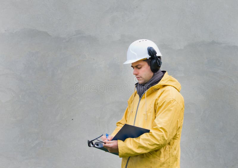 Engineer in safety suit stock image. Image of handsome - 35608643
