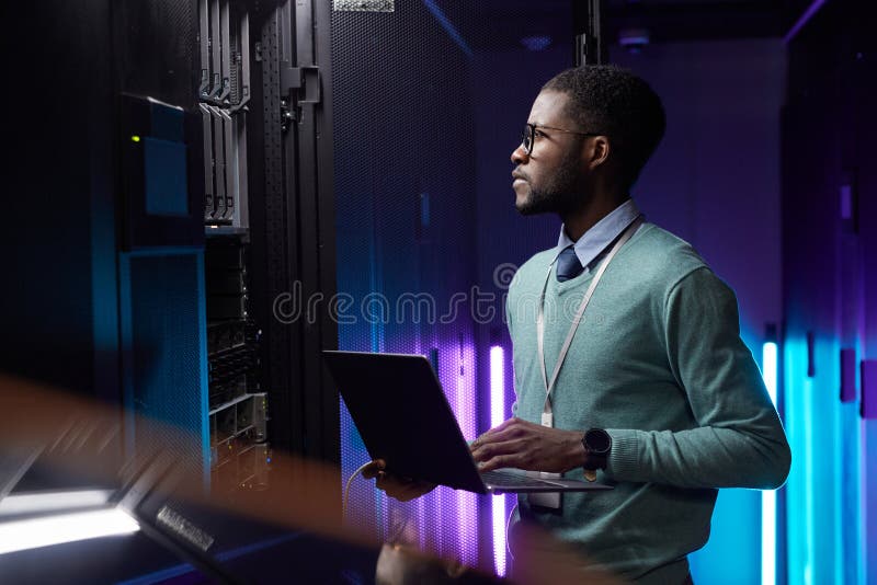 It Engineer in Server Room stock image. Image of business - 211122645