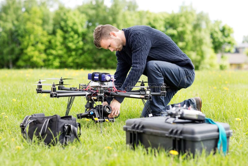 Engineer Flying UAV Helicopter in Park Stock Image - Image of ...