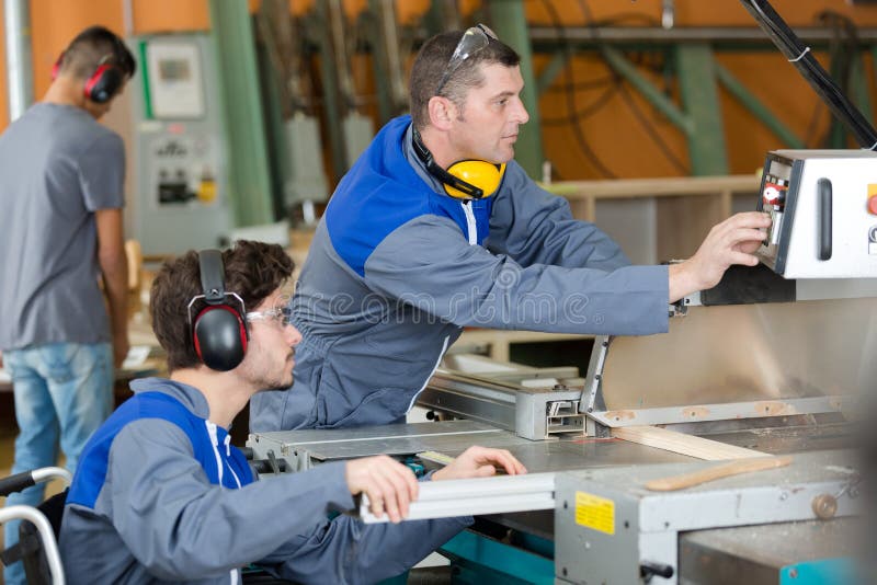 Engineer Setting Up Machine for Production Stock Photo - Image of ...