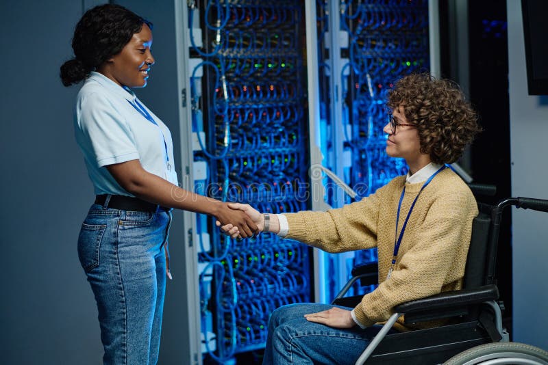 Engineer Shaking Hands with Server Worker in Data Center Stock Photo ...