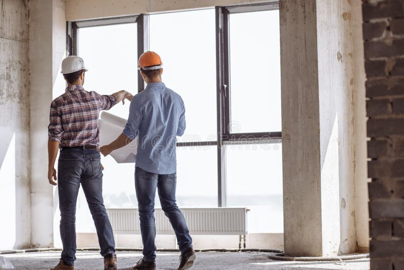 Engineer Is Showing The Execution Of Building Project To A Customer ...