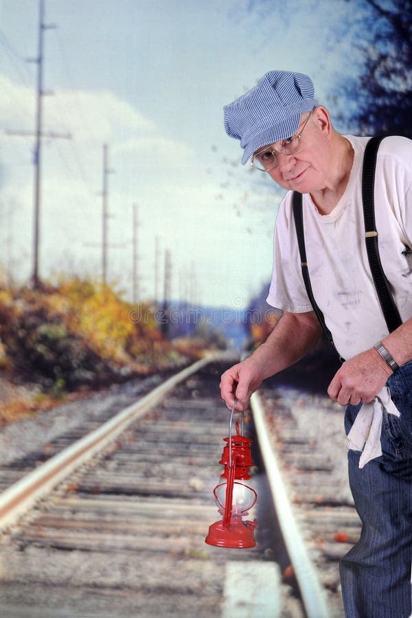 Engineer Signalling Train Coming Stock Photo - Image of striped, lines ...