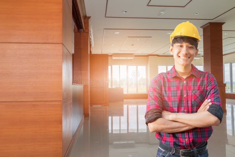 Engineer Checking in Decorate Interior Room Completed with Hand Holding ...