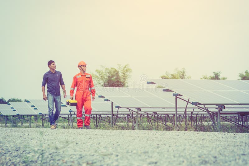 Engineer in Solar Power Plant Working on Installing Solar Panel Stock ...