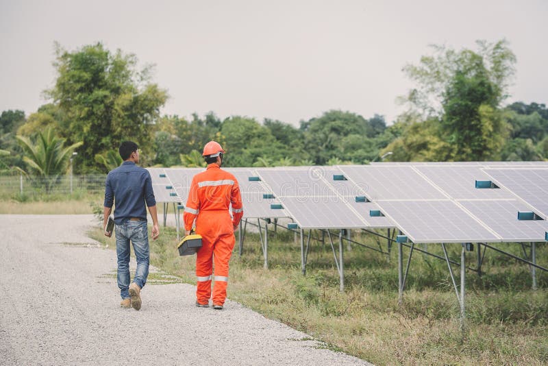 Engineer in Solar Power Plant Working on Installing Solar Panel Stock ... Engineer in Solar Power Plant Working on Installing Solar Panel Stock ...
