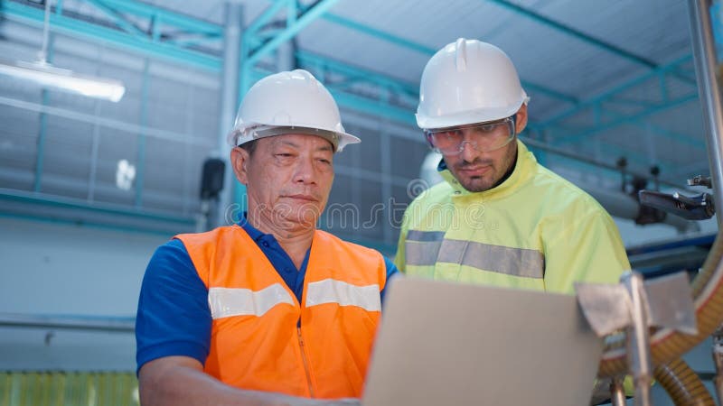 Engineer Specialist Checking and Controlling Machine in Industrial ...