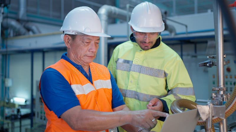 Engineer Specialist Checking and Controlling Machine in Industrial ...