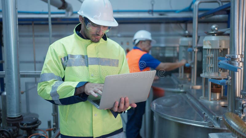 Engineer Specialist Checking and Controlling Machine in Industrial ...