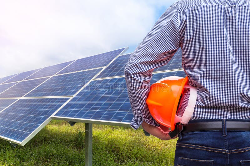 Engineer Stand Holding Yellow Construction Helmet in Solar Power ...