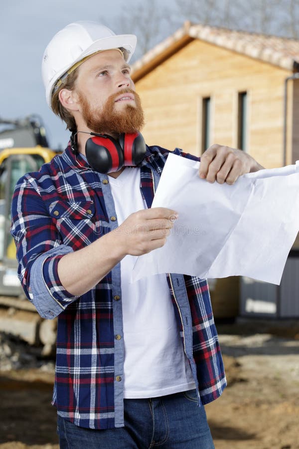 Engineer Standing with Builder Outdoors Stock Photo - Image of ...