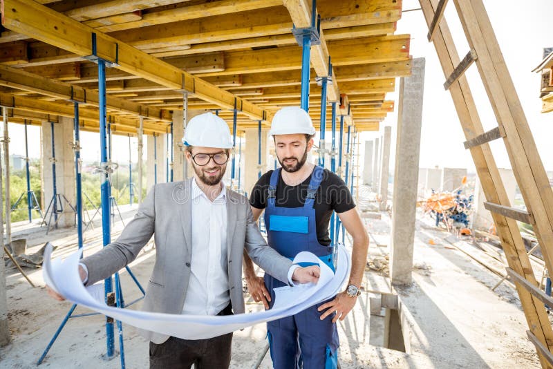 Engineer with Builder on the Structure Stock Photo - Image of ...