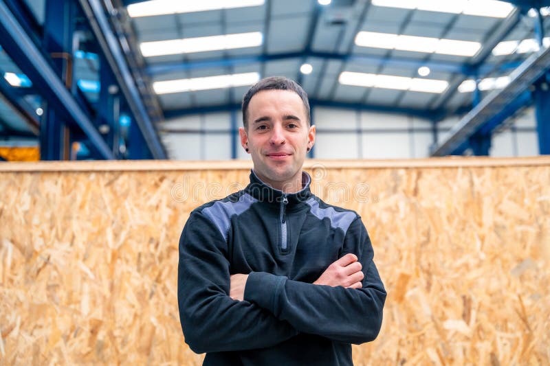 Engineer Standing Proud with Arms Crossed in a Factory Stock Image ...