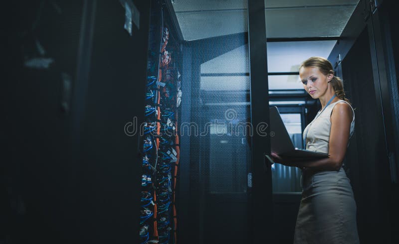 It Engineer Standing before Working Server Rack Doing Diagnostics Using ...