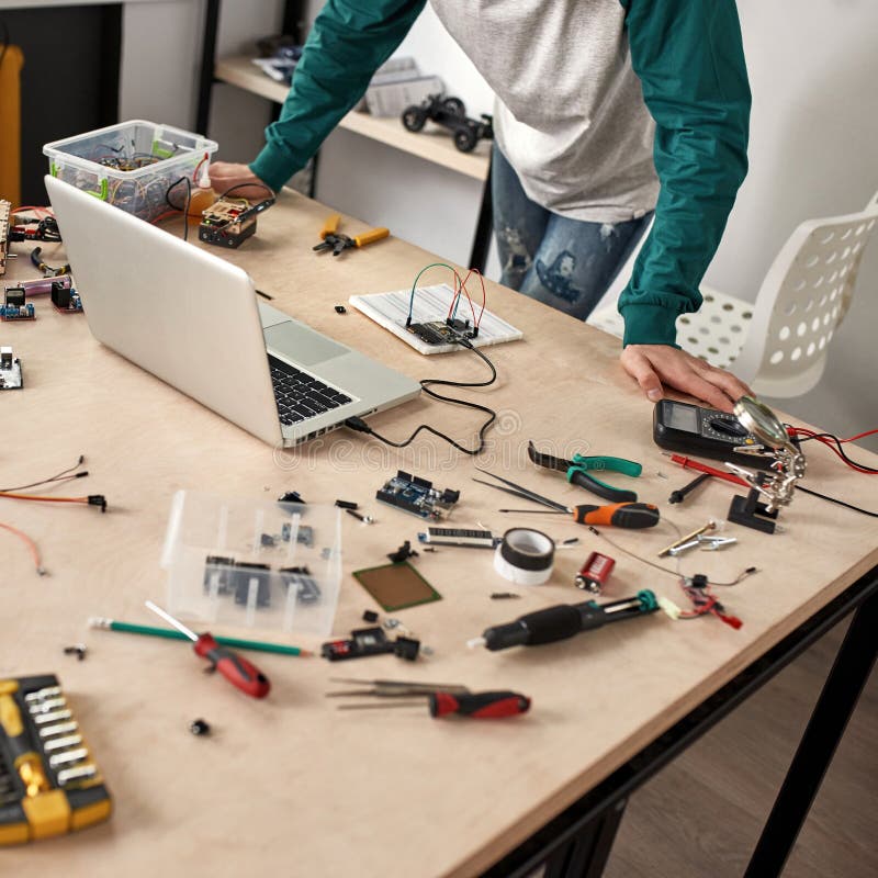 Engineer Standing and Working at Table with Laptop Stock Image - Image ...