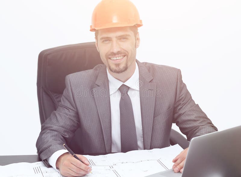 Engineer is Studying the Draft,sitting Behind a Desk Stock Photo ...
