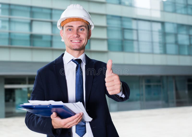 Engineer in Suit and Hat with Folder is Satisfied with Realisation His ...