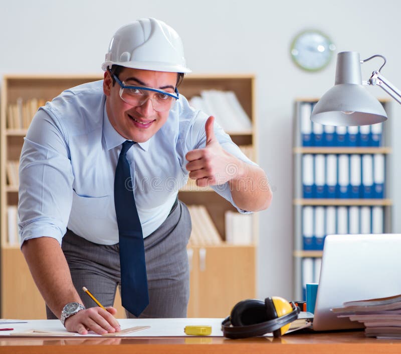 Engineer Supervisor Working on Drawings in the Office Stock Image ...