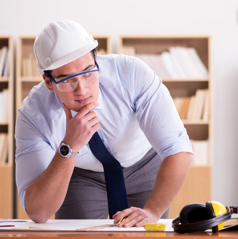 Engineer Supervisor Working on Drawings in the Office Stock Image ...