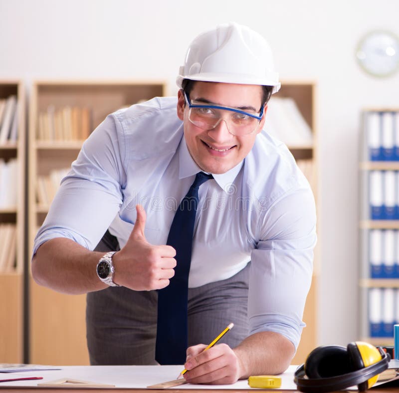 Engineer Supervisor Working on Drawings in the Office Stock Image ...