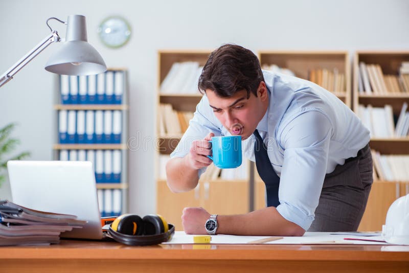 The Engineer Supervisor Working on Drawings in the Office Stock Image ...