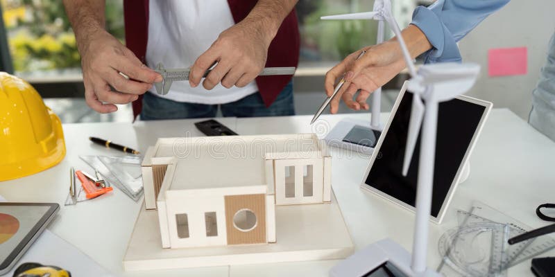 Engineer and Sustainability. Team Collaborating on Eco-friendly ...