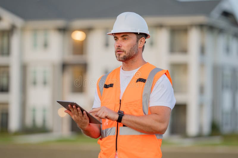 Engineer with Tablet, Building Inspection. Construction Man in Helmet ...