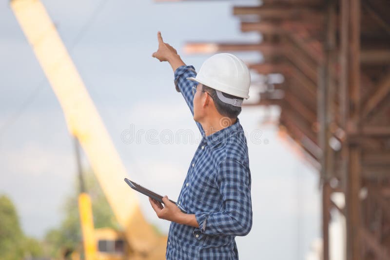 Engineer with Tablet at the Infrastructure Construction Site, Man in ...